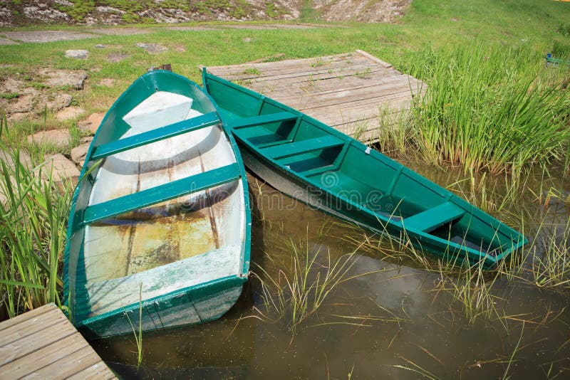 Green Rowing Boat Upside Down on Beach Stock Image - Image of sailing ...