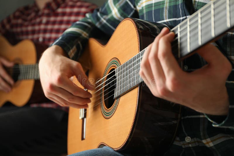 Two Guitar Players with Classic Guitars Stock Image - Image of acoustic ...