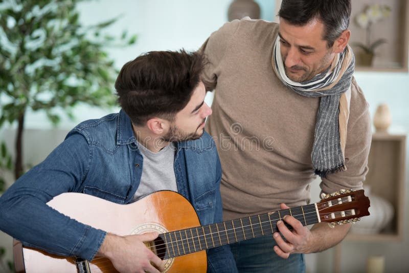 Two Guitar Players Practising Together Stock Photo - Image of exercises ...