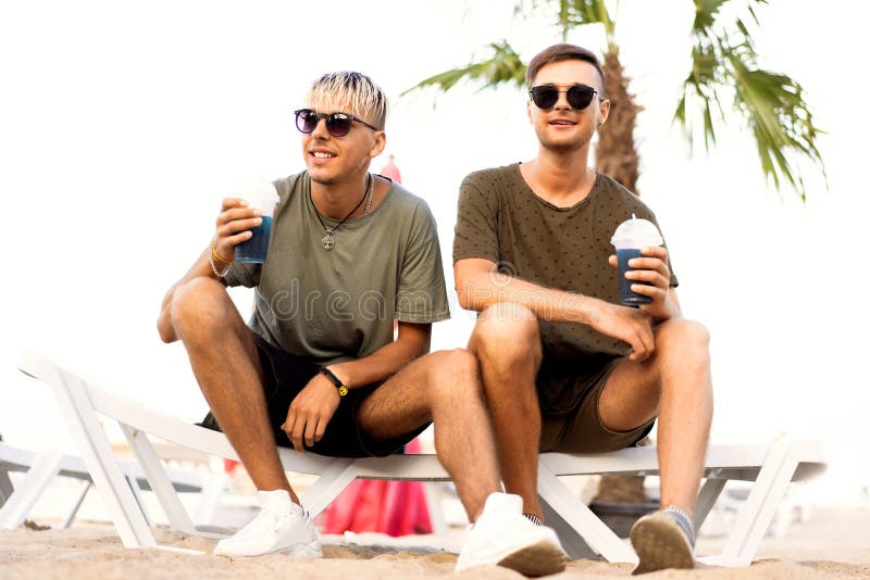 Two Guys Drink Cocktails on a Tropical Beach Stock Image - Image of ...