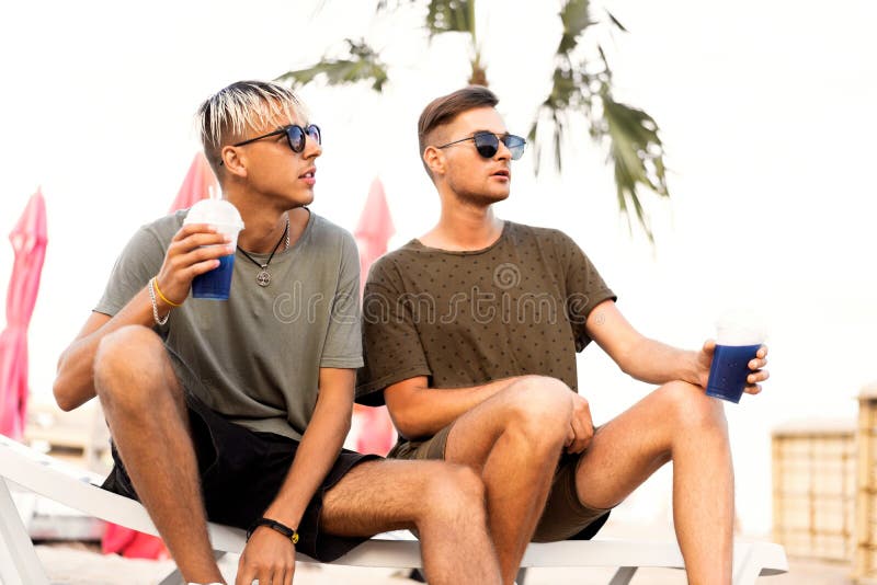 Two Guys Drink Cocktails on a Tropical Beach Stock Photo - Image of ...