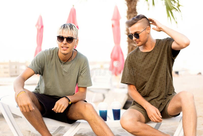 Two Guys Drink Cocktails on a Tropical Beach Stock Image - Image of ...