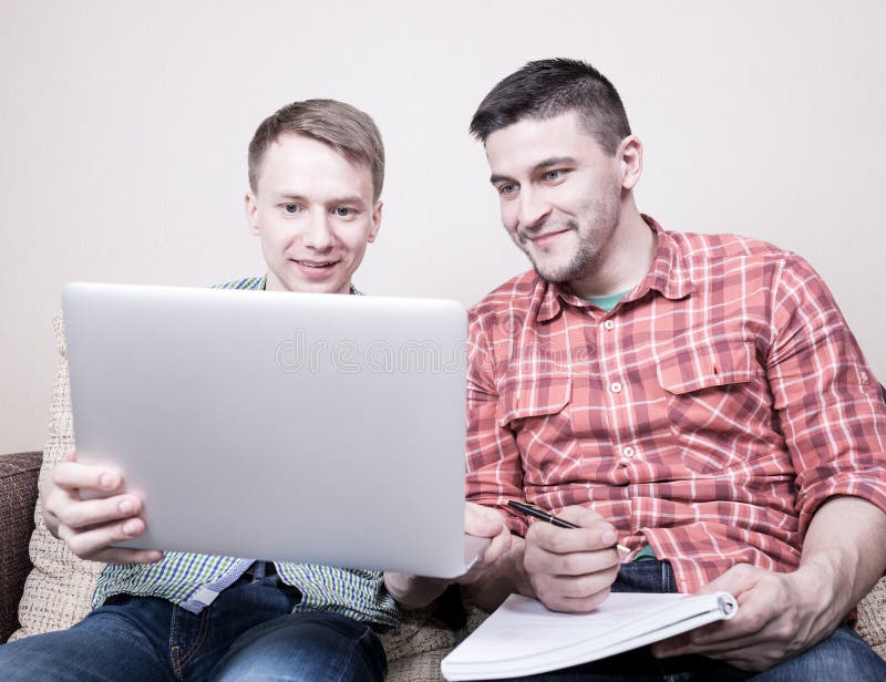 Two guys with gadgets stock image. Image of style, gadget - 71987431
