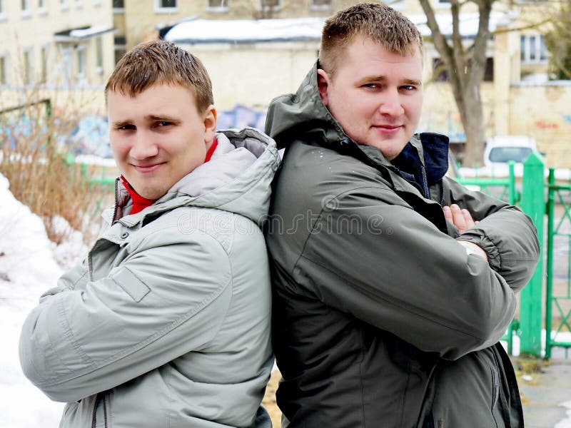 Two guys in jackets stock image. Image of friend, warm - 30426297