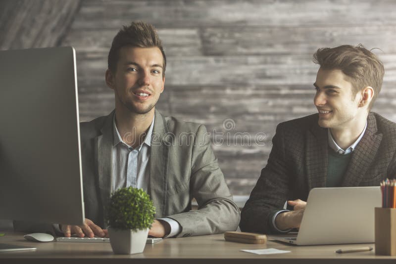 Guys Using Computer and Doing Paperwork Stock Photo - Image of adults ...