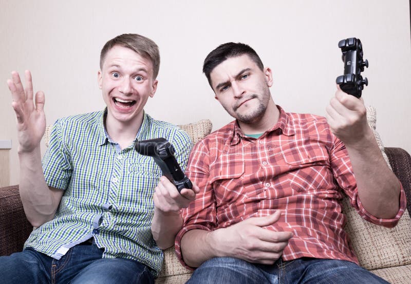 Two Guys Playing Video Games Stock Image - Image of leisure, joystick ...