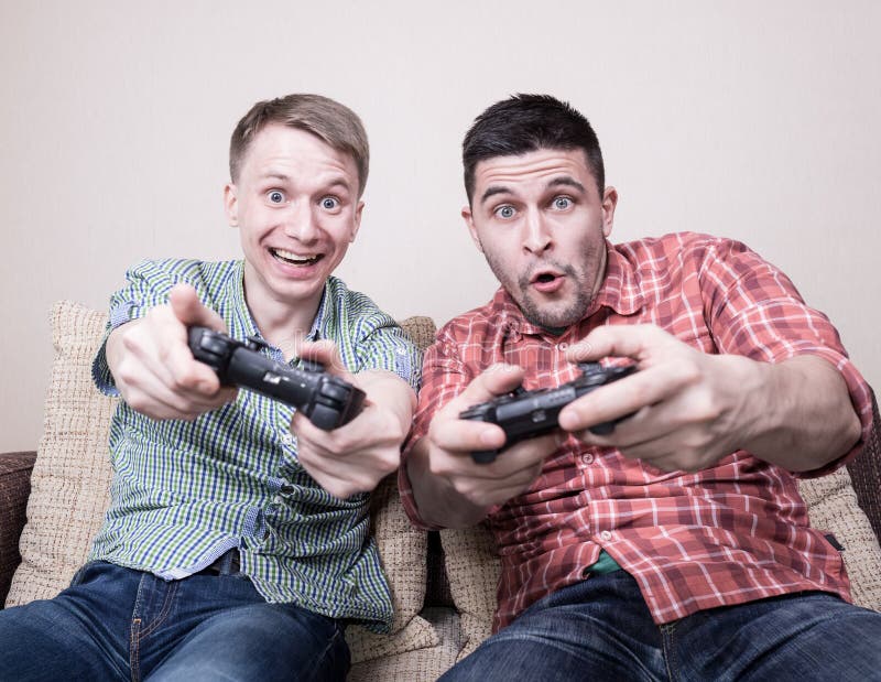 Two guys playing stock image. Image of friendship, enjoyment - 71176529