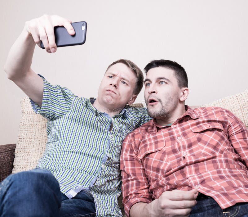 Two guys taking selfie stock image. Image of selfie, sofa - 71295579