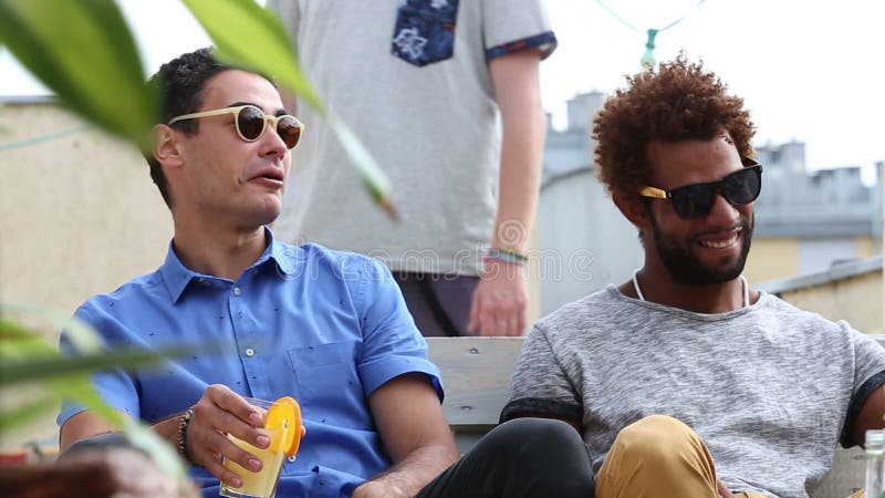 Two Guys Talking at Rooftop Party Stock Footage - Video of male ...