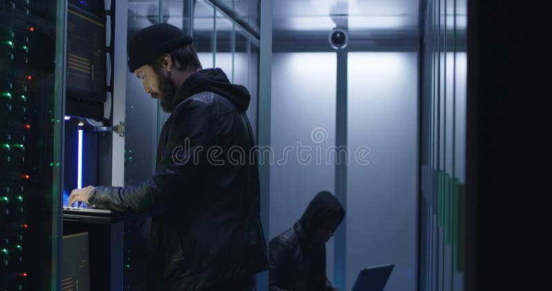 Two Hackers Beginning an Attack on Servers Stock Image - Image of data ...