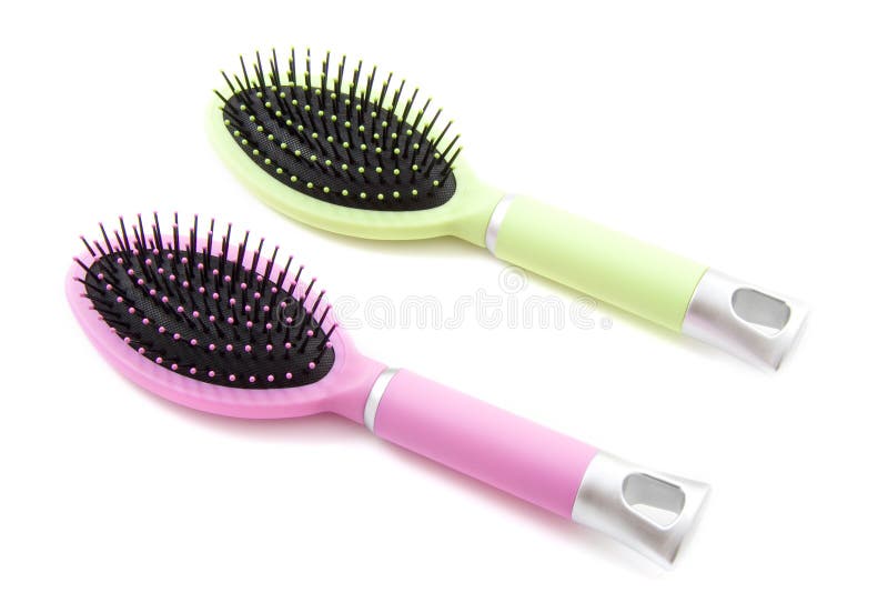 Two hairbrushes stock image. Image of objects, purple - 12909359