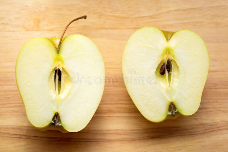 Two halves of an apple stock image. Image of seed, pair - 23597811