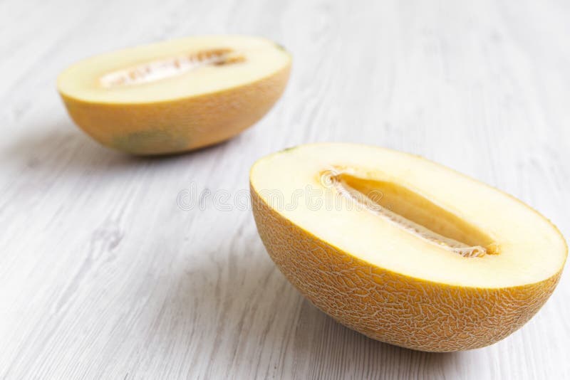 Two Halves of Melon, Side View. Stock Photo - Image of wooden, fruit ...
