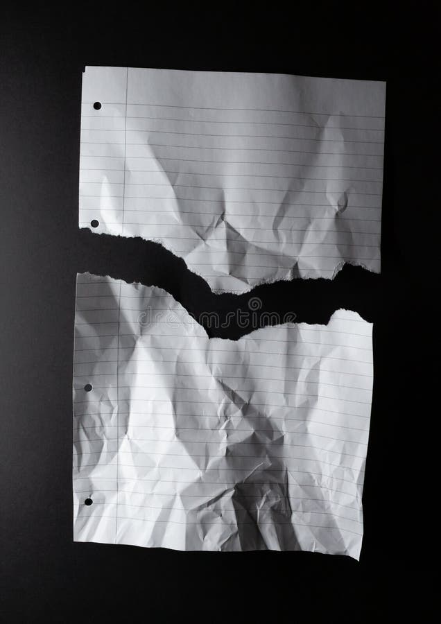 Two Halves of Scrunched Up, Hole Punched Sheet of Lined White Notebook ...