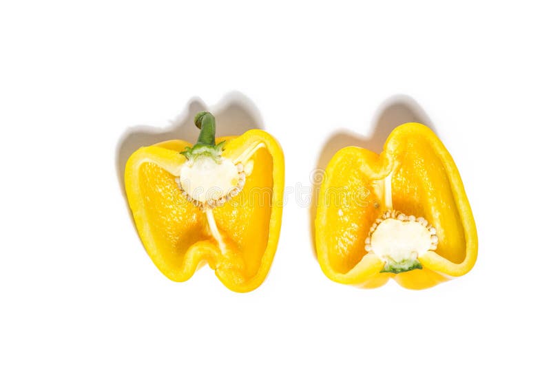 Two Halves of Yellow Sliced Pepper Isolated on White Stock Photo ...