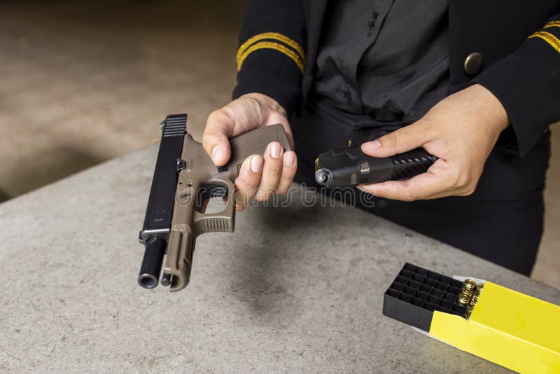 Two Hand Reloading Law Enforcement Pistol in Academy Shooting Range ...