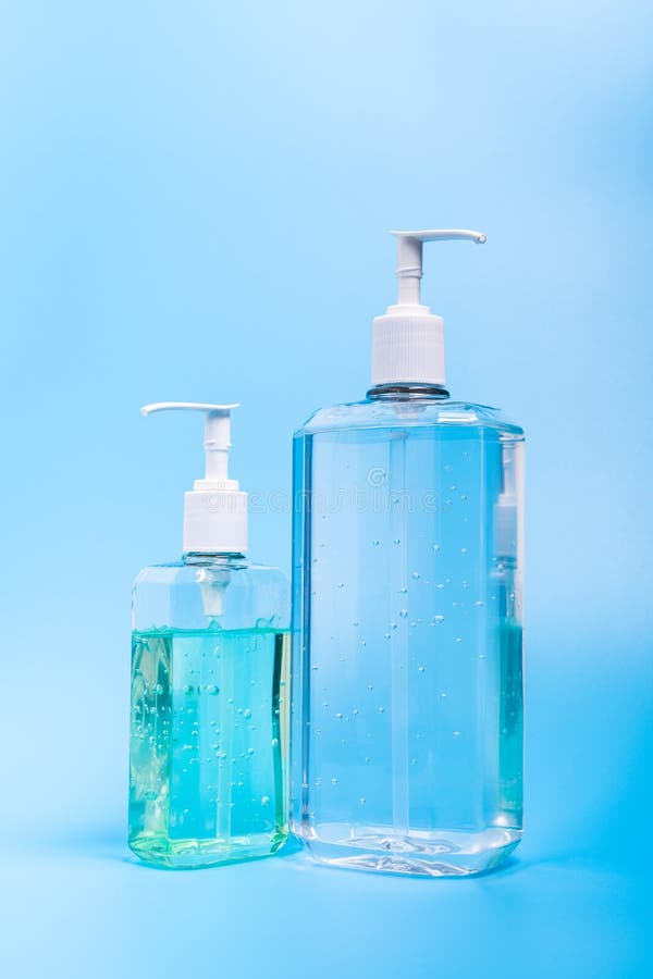 Two Hand Sanitizer In Plastic Bottle On Blue Background Stock Image ...