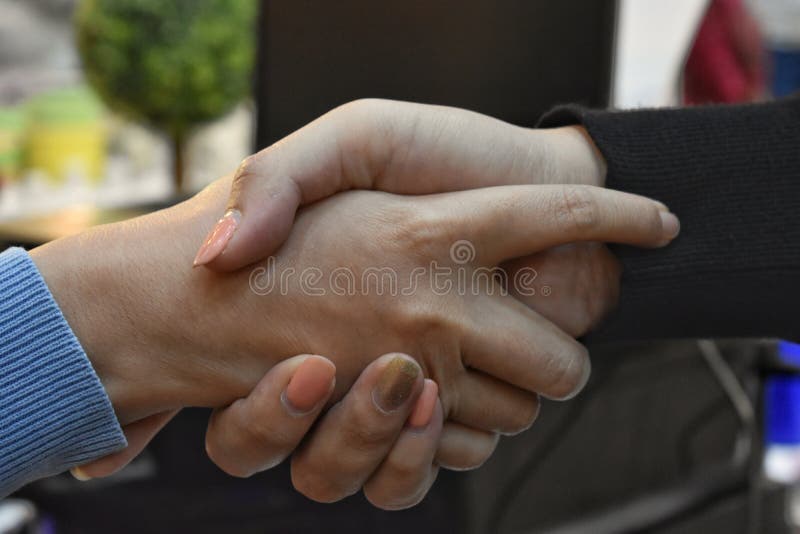 Intertwined Hands Stock Photos - Download 225 Royalty Free Photos