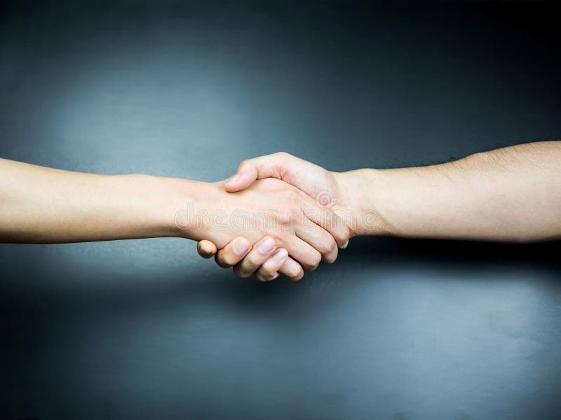 Two Handed Handshake on Black Background Stock Image - Image of ...