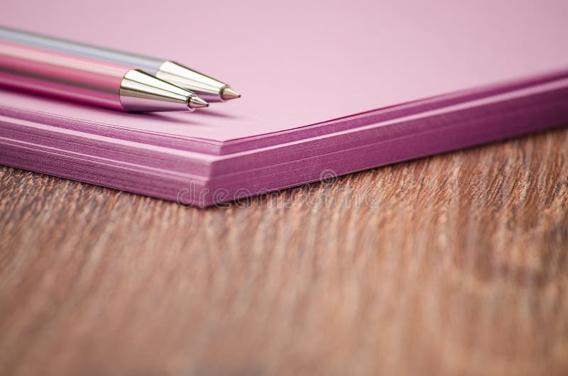 Two Handles on the Stack of Purple Paper Stock Image - Image of plan ...