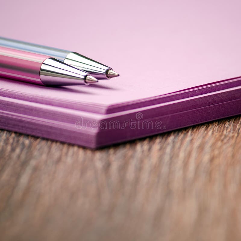 Two Handles on the Stack of Purple Paper Stock Image - Image of note ...