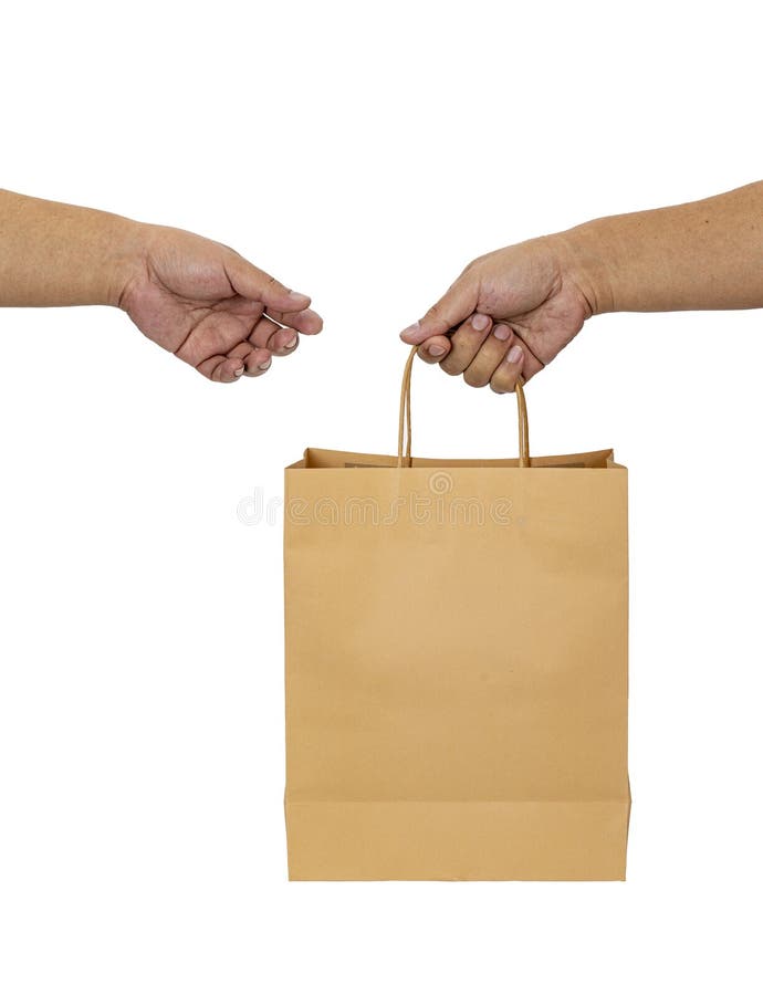 Two Hands Exchanging Brown Paper Bag, Symbolizing Transaction or ...