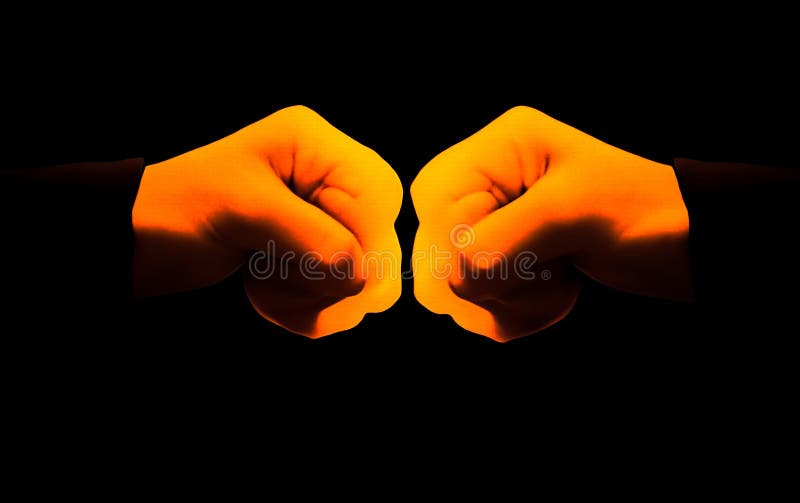 Two Hands Fist Bumping in Glowing Light Against Black Background Stock ...