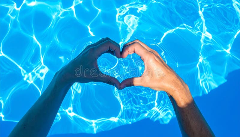 Shadows of Hands Forming a Heart on Blue Swimming Pool Water Background ...