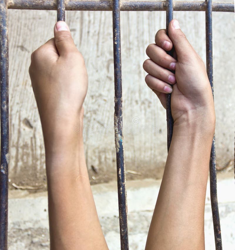 Two Hands are Grabbing Steel Cage Stock Photo - Image of male, lock ...