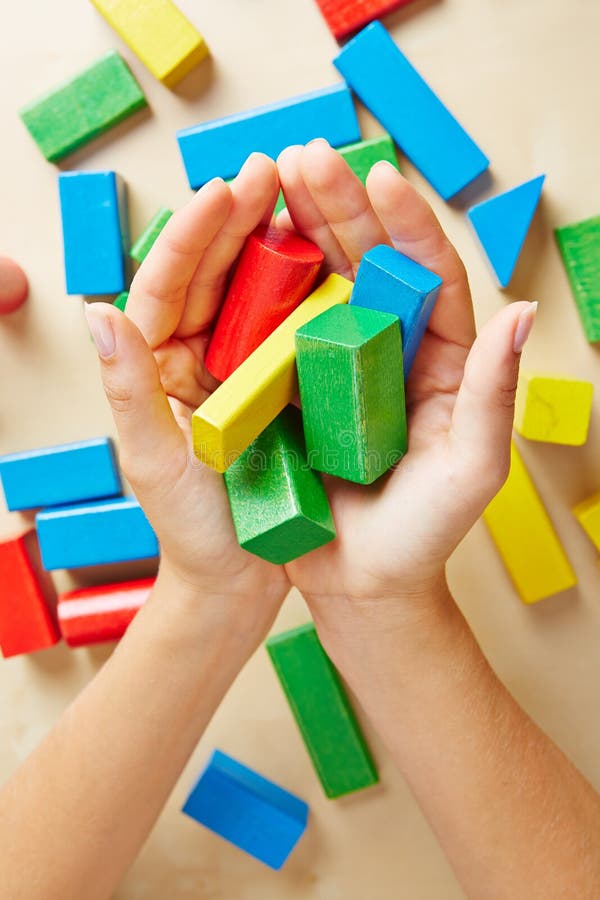 Two Hands Holding Building Blocks Stock Photo - Image of play, creative ...