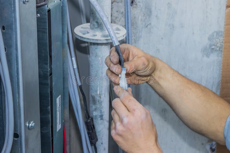 Two Hands Holding 4-Pin Cable Plug and Socket Stock Image - Image of ...