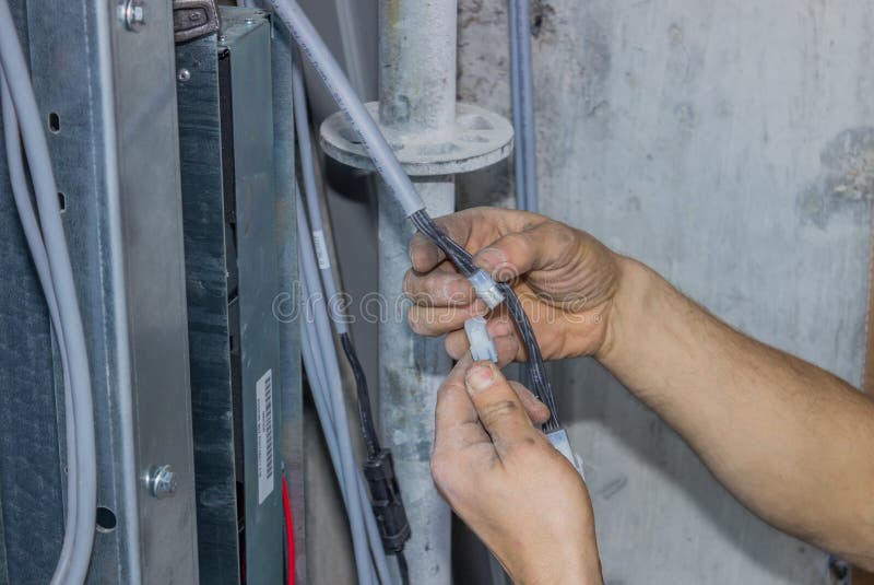 Two Hands Holding 4-Pin Cable Plug and Socket Stock Image - Image of ...