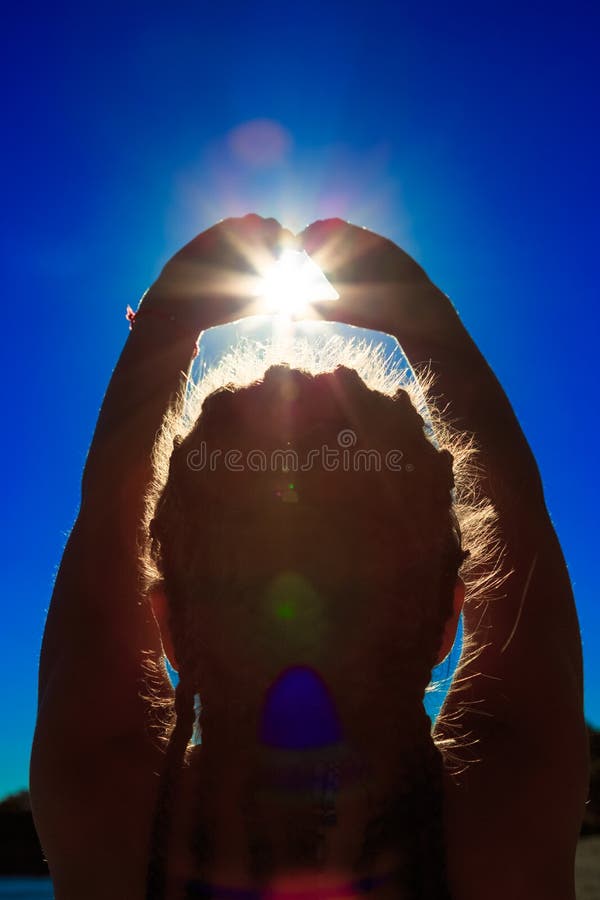 Two Hands Holding the Sun on a Blue Sky Background Stock Image - Image ...