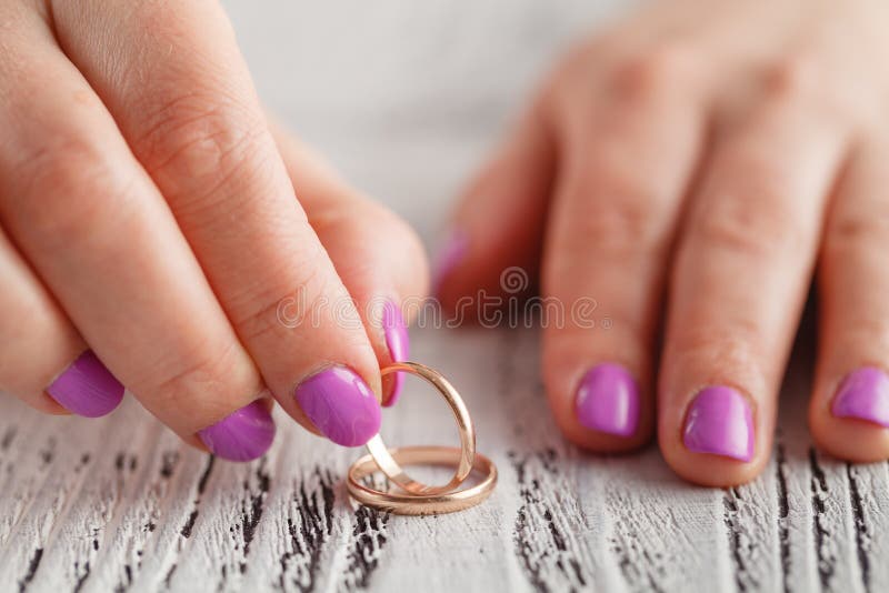 Two Hands Holding Two Gold Rings Wedding Stock Photo - Image of gold ...