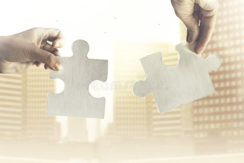 Two Hands Join Together Two Pieces of Puzzle, Concept of Strategy and ...