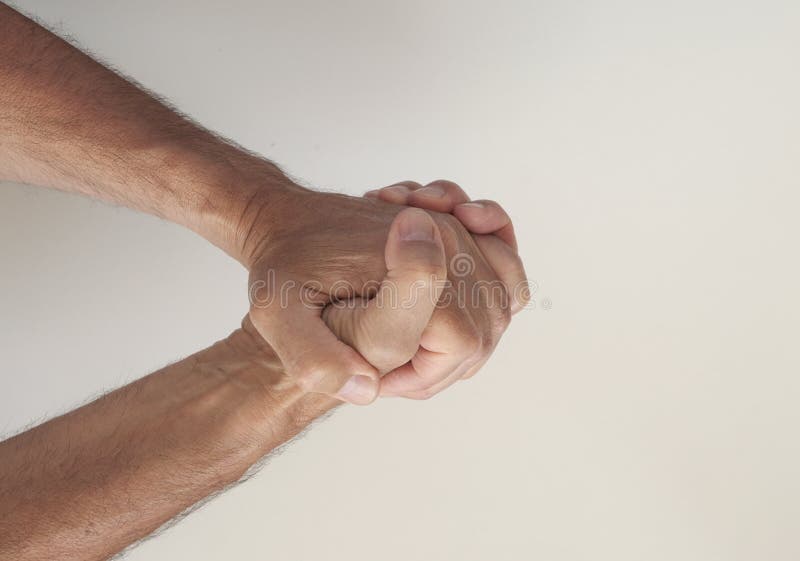 Two Hands Joined in a Handshake on a Light Background Stock Image ...