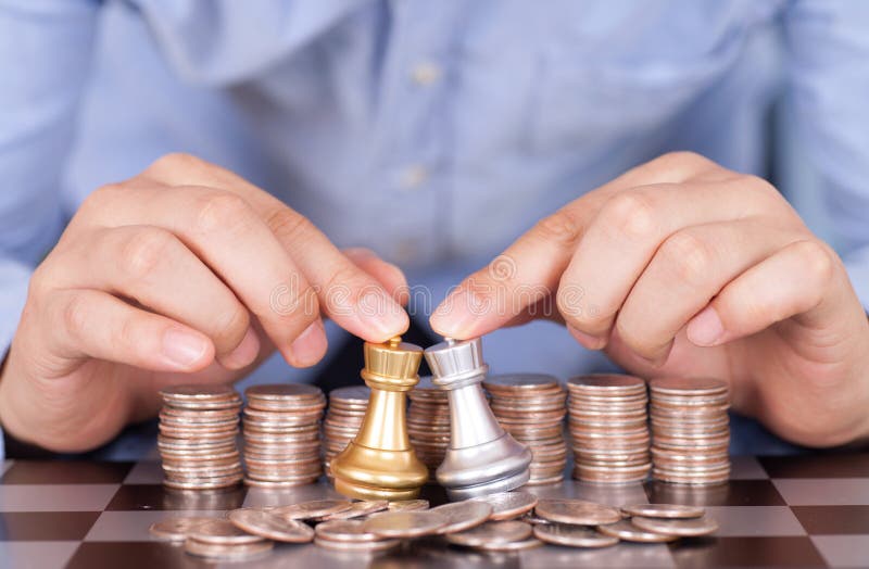 Two Hands Next To the Dollar Coin Help Two Chess Rooks Duel Stock Photo ...
