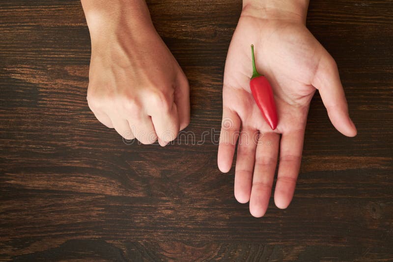 Two Hands Offering Red Pepper Stock Image - Image of wood, hands: 78786473
