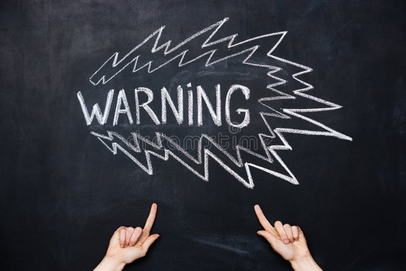 Two Hands Pointing at Warning Drawn on Blackboard Stock Photo - Image ...