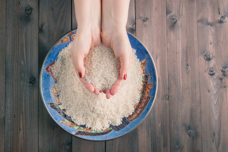 Two Hands Rice Grains Over Plate Stock Photos - Free & Royalty-Free ...