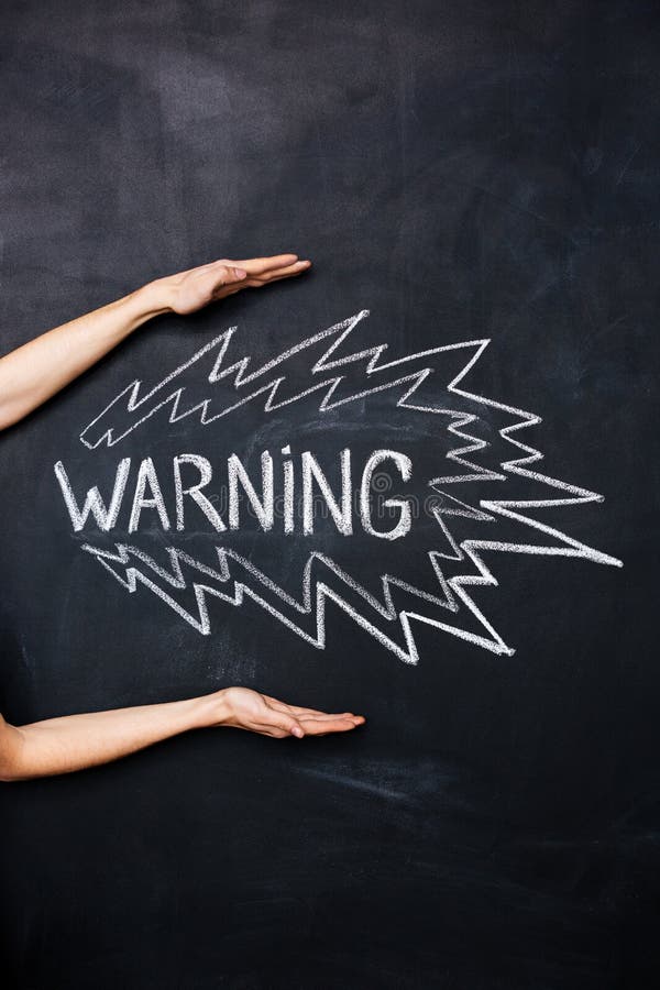 Two Hands Showing Warning Drawn on Blackboard Stock Photo - Image of ...