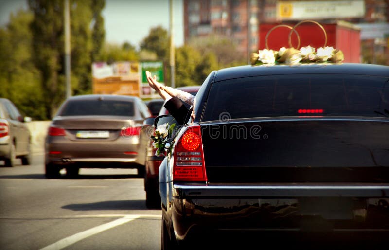 Two Hands Stick Out of the Wedding Car Window Stock Image - Image of ...