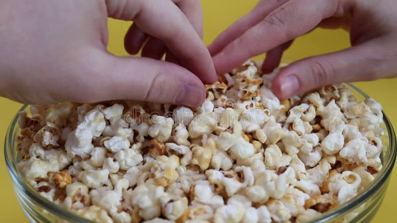 Two Hands Taking Popcorn from Bowl Stock Footage - Video of home, food ...
