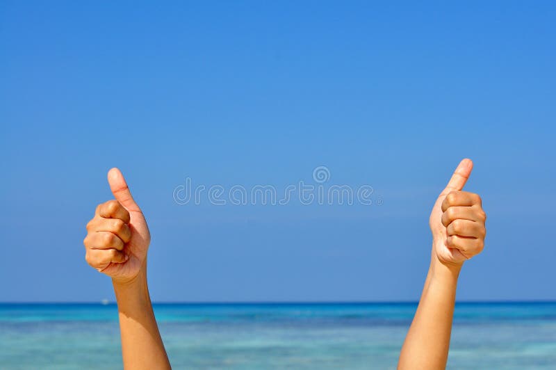 Two Hands with Thumb Up on Blue Sky and Sea Backgr Stock Image - Image ...