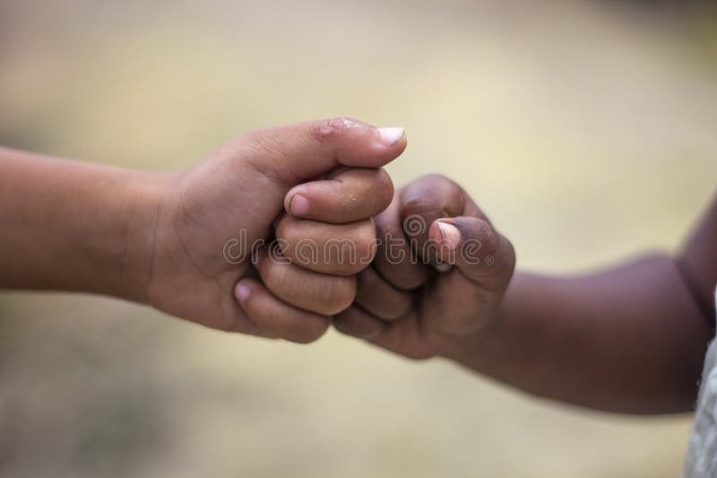 Two Hands are Wrapped Together and the Background is Blurred Stock ...