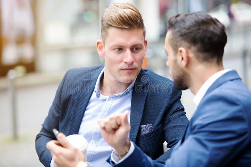 Two Businessmen Talking Outside in the Street Stock Photo - Image of ...