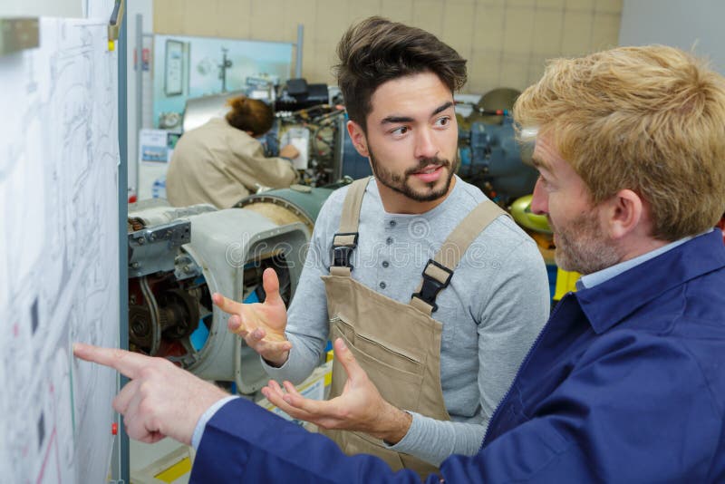 Two Handsome Carpenters Talking in Workshop Stock Image - Image of ...