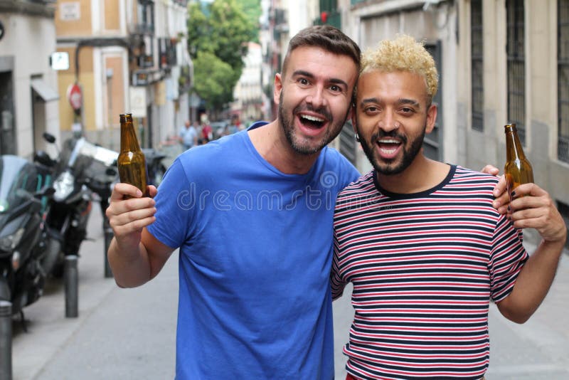 Two Handsome Dudes Drinking Outdoors Stock Image - Image of hispanic ...