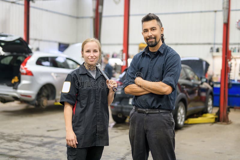 Two Handsome Mechanic Worker in Uniform Worker Stock Photo - Image of ...