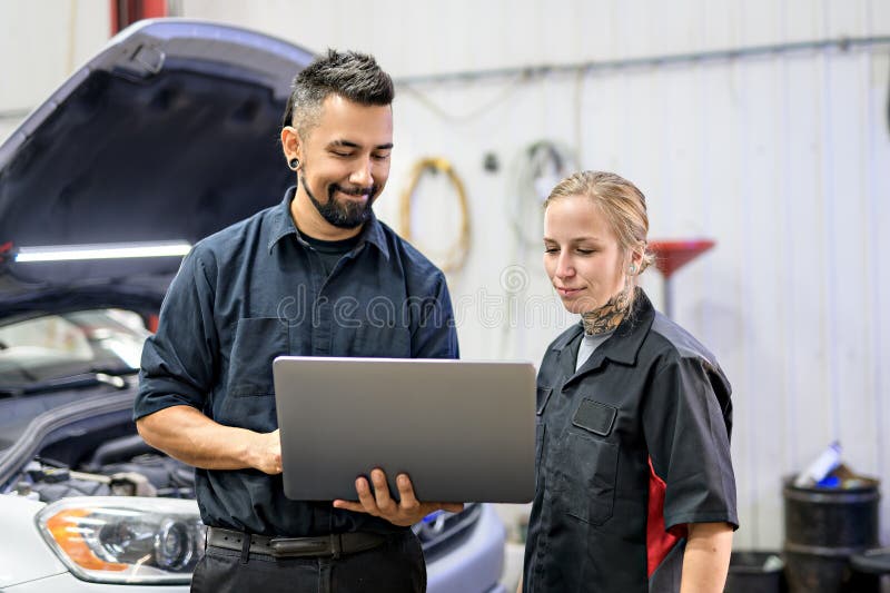 Two Handsome Mechanic Worker Uniform Working Car Laptop Stock Photos ...